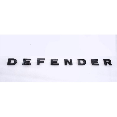 EMBLEMA DELANTERO O TRASERO LETRAS DEFENDER GRIS