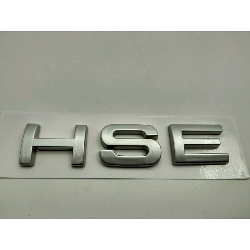 EMBLEMA TRASERO HSE LAND ROVER PLATA